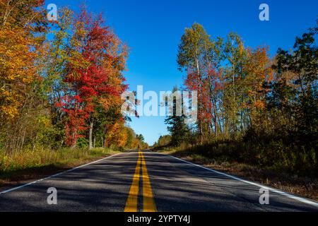 Highway 107 going through a colorful Wisconsin forest in early October ...