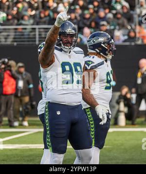 Seattle Seahawks defensive end Leonard Williams (99) celebrates during ...