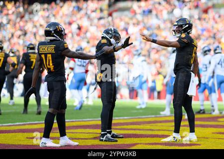 Washington Commanders wide receiver Olamide Zaccheaus (14) celebrates ...