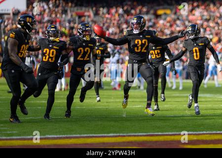 Washington Commanders linebacker Mykal Walker (32) smiles following an ...