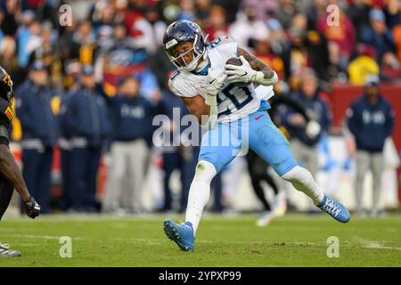 Tennessee Titans running back Tony Pollard (20) runs the ball against ...