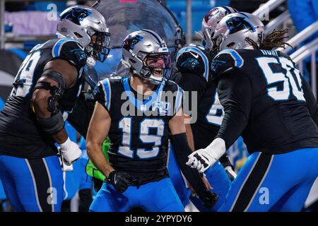 NFC guard Robert Hunt, of the Carolina Panthers, watches the action ...