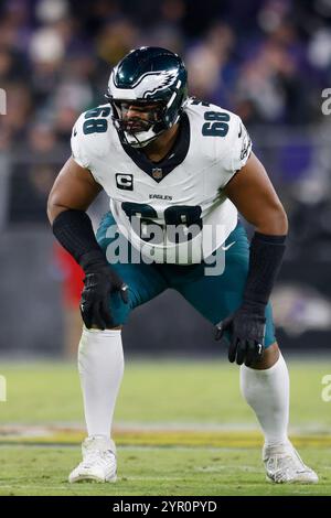 Philadelphia Eagles tackle Jordan Mailata helmet hits on the bench post ...