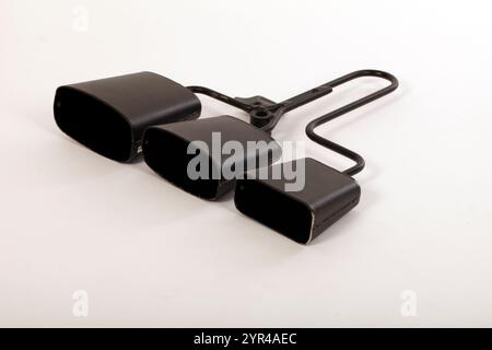 Set of three differently tuned cowbells High medium and low Stock Photo ...