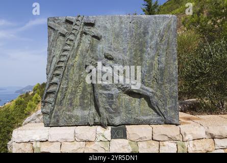 Religious scene depicted on Stations of the Cross sculpture located ...
