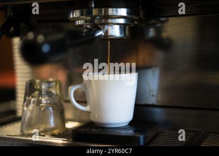 closeup shot of espresso machine brewing coffee, wide photo Stock Photo ...
