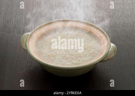 Brown rice gruel Stock Photo - Alamy