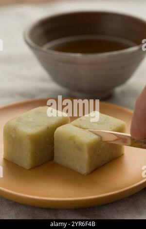 Scene of eating taro yokan Stock Photo - Alamy