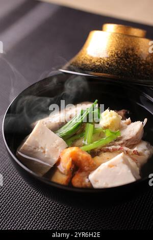 Fish guts soup Stock Photo - Alamy