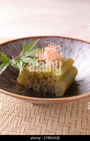 Sauteed and simmered Japanese butterbur Stock Photo - Alamy