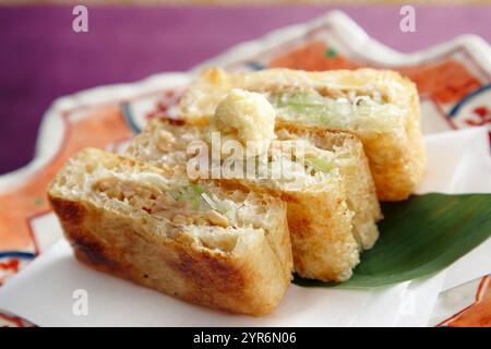 Deep-fried deep-fried tofu with natto clams Stock Photo - Alamy
