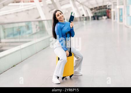 Solo woman enjoying a vacation in paris, wearing a red beret ...
