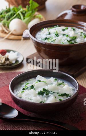 Spring rice gruel with seven herbs Stock Photo - Alamy