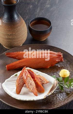Smoked chicken and sake Stock Photo - Alamy
