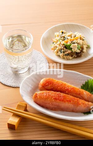 Spicy cod roe and cold sake Stock Photo - Alamy