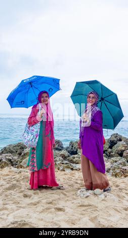 Some people vacation at Sadranan Beach. Sadranan is one of the beaches ...