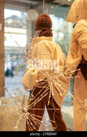 Christmas clothing shop windows details, no people are visible Stock ...