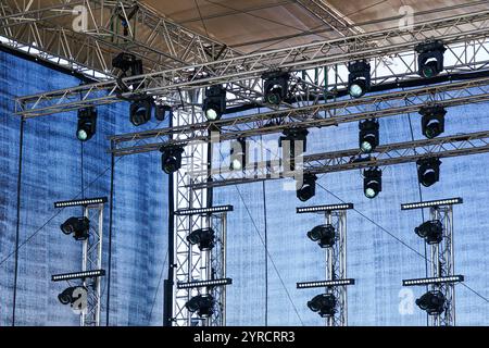 Fragment of metal trusses and lighting elements of a large outdoor ...