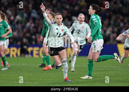 Wales' Hannah Cain (centre) celebrates scoring their side's first goal ...