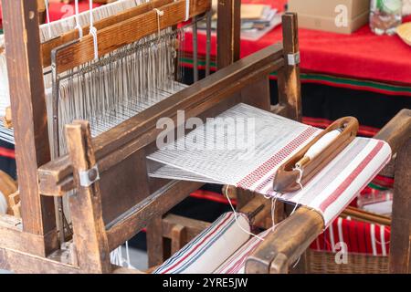 Old traditional wooden weaving loom on old traditional Romanian house ...