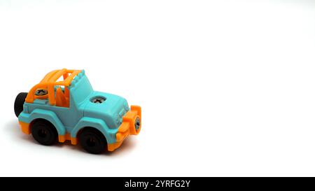 Plastic Toy Cars In Turquoise And Orange, Isolated On White Background ...