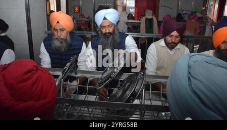 AMRITSAR, INDIA - DECEMBER 3: As per tankhah (religious punishment ...