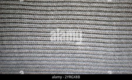 Banner made with gray knitted sweater, wooden knitting needles and ice ...