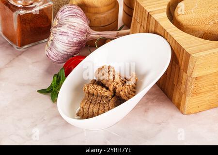 Liver pate in the bowl served basil leaves Stock Photo - Alamy