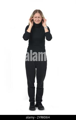 Slim woman covers her bare breasts isolated on a light background ...