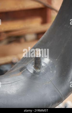 Black rubber car tire inner tube isolated on white Stock Photo - Alamy