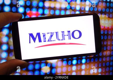 In this photo illustration the Mizuho logo of a Japanese financial ...