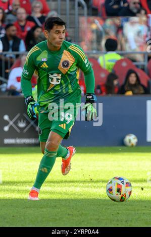 Inter Miami goalkeeper Oscar Ustari, center, is given a yellow card as ...
