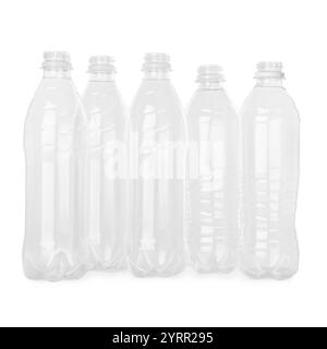Many empty plastic bottles isolated on white Stock Photo - Alamy