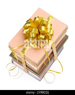 Stack of books with golden bow as gift isolated on white Stock Photo ...