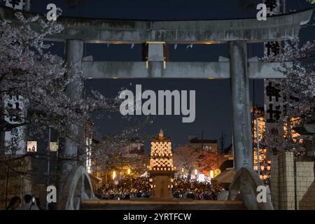 Night floats at the Shingaku Festival from the large torii gate of ...