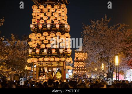 Night float parade of Shingaku Festival along Honmachi Street Stock ...