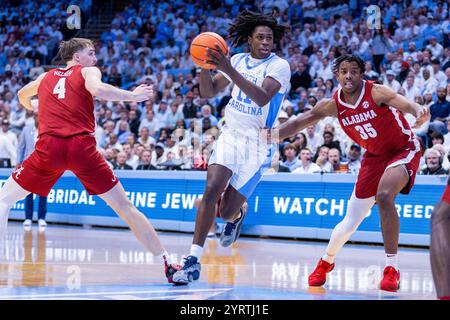Alabama forward Grant Nelson (4) drives against Duke forward Cooper ...