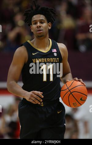 Vanderbilt guard AJ Hoggard (11) looks to shoot over Oklahoma guard ...