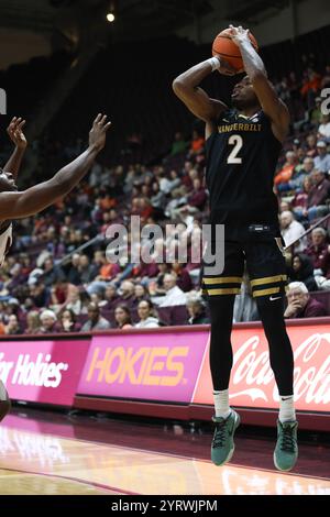 Vanderbilt guard MJ Collins Jr. (2) shoots the ball past Kentucky ...