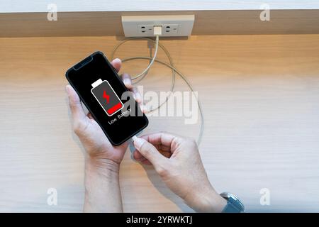 Man's hands using smart phone at office desk close up Stock Photo - Alamy