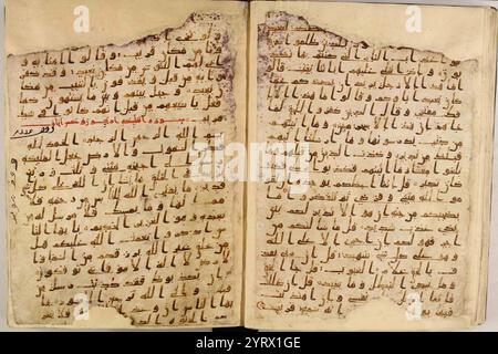 The Codex Mashhad, MS 4116, folios B121b and B122a, feature Surah 77 (al-Mursalat) and Surah 78 ...