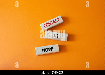 Contact us now symbol. Wooden blocks with words Contact us now ...
