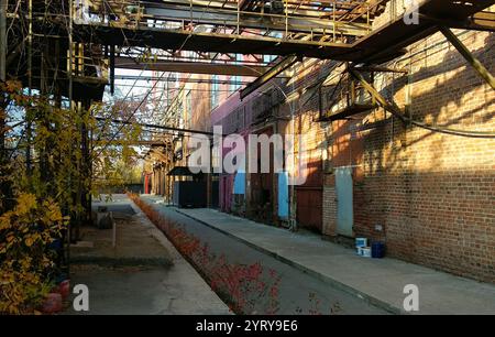 View of the backyard and the facade of the old factory Stock Photo - Alamy
