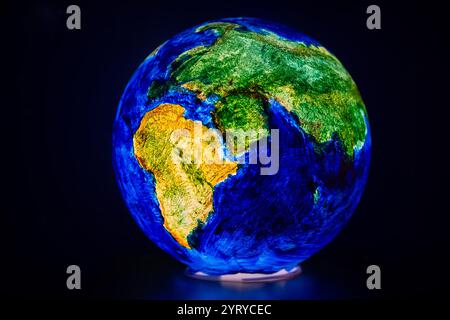 The globe is illuminated from the inside on a dark background Stock ...