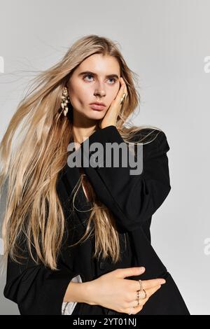 Beautiful blonde woman confidently showcases her denim fashion in a ...