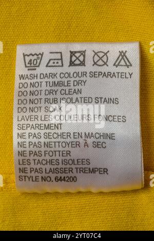 wash care instructions and symbols on label on garment clothing made in ...