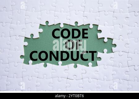 Code of conduct symbol. White Puzzle with words Code of conduct ...