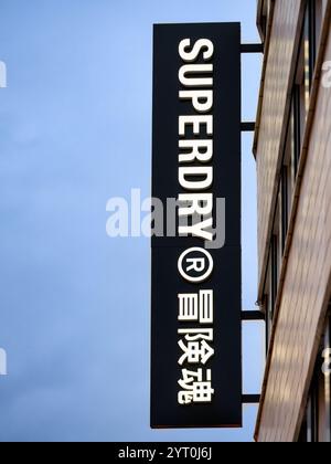 Cologne, Germany, December 04 2024: Illuminated advertising sign with ...