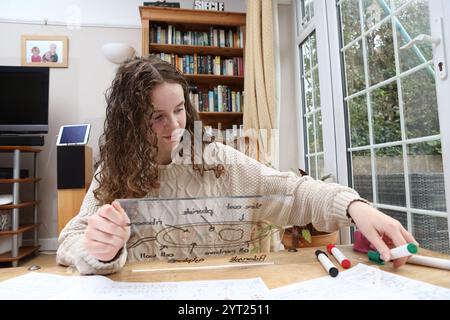 Teenager studying revising science biology cell structure GCSE drawing ...