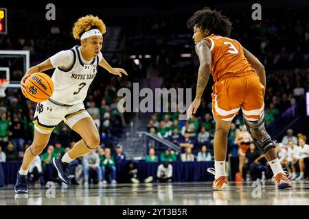 Texas guard Rori Harmon drives against Penn guard Mataya Gayle during ...